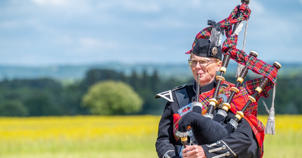 Julia - Traditional Highland Bagpiper for Hire | TPE